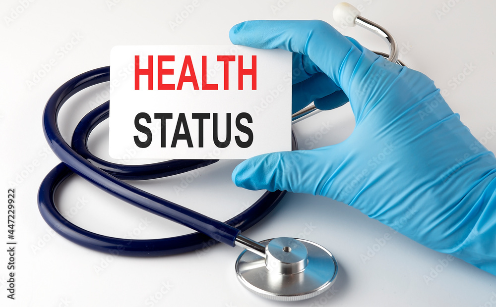 Poster Card with text HEALTH STATUS supplies, pills and stethoscope ...