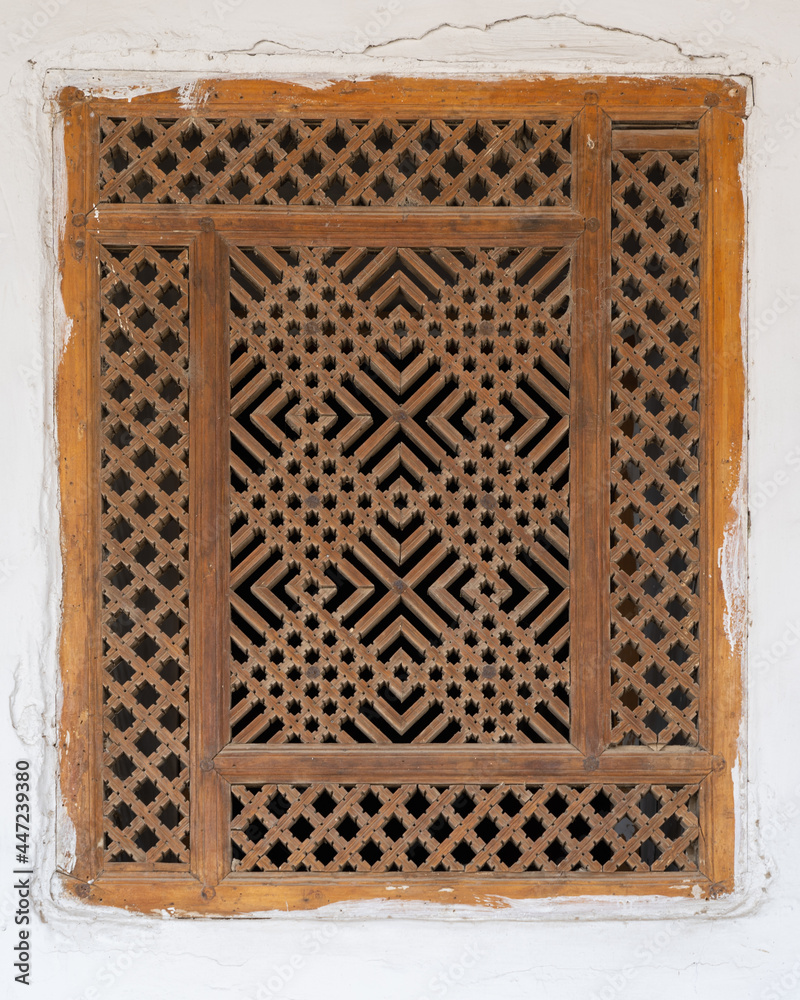Traditional wooden geometric latticework with islamic pattern at Sar-i ...