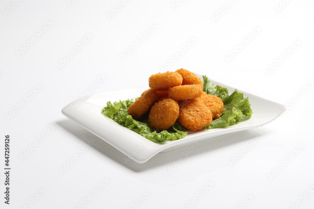 deep fried crispy golden scallops or chicken or fish nugget salad in ...