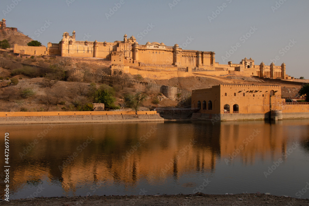 Amber Fort wth its large ramparts and series of gates and cobbled paths ...