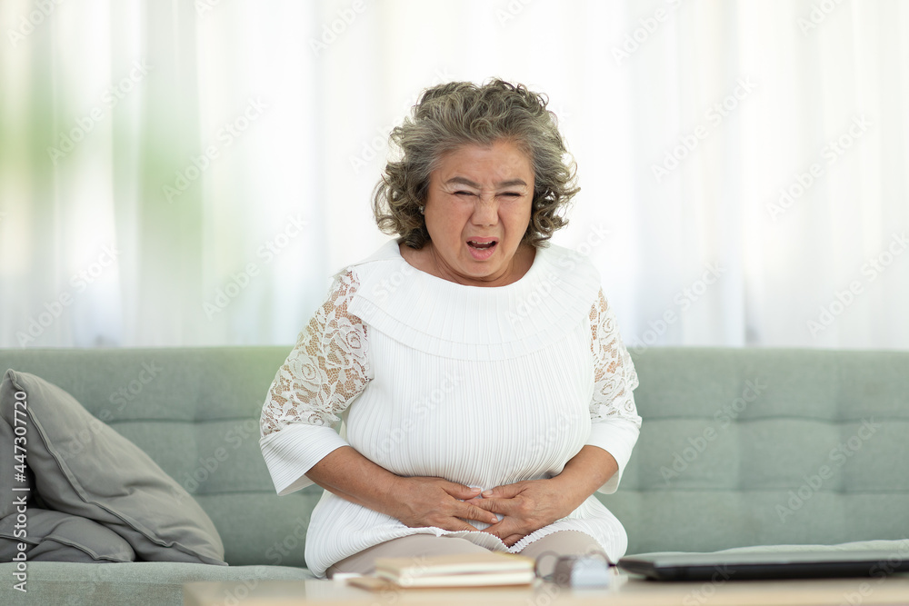Asian Elderly senior woman stomach ache so pain illness,food poisoning ...