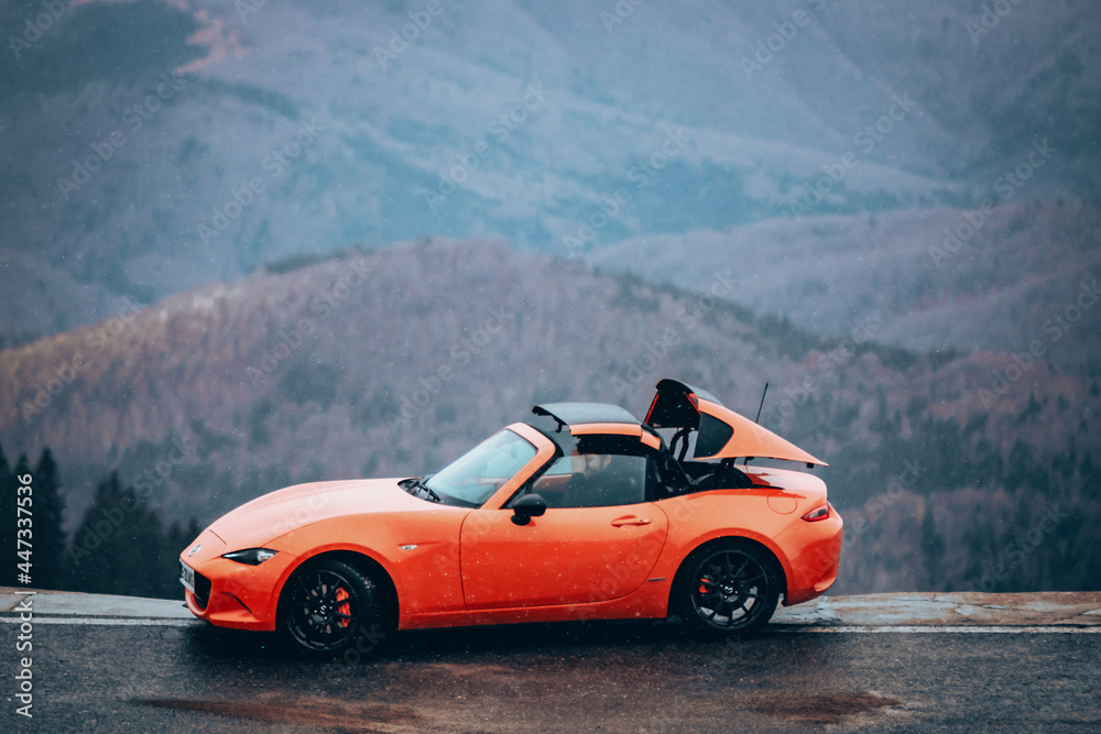 Mazda MX-5 ND RF 30th Anniversary edition Miata side view while it is ...