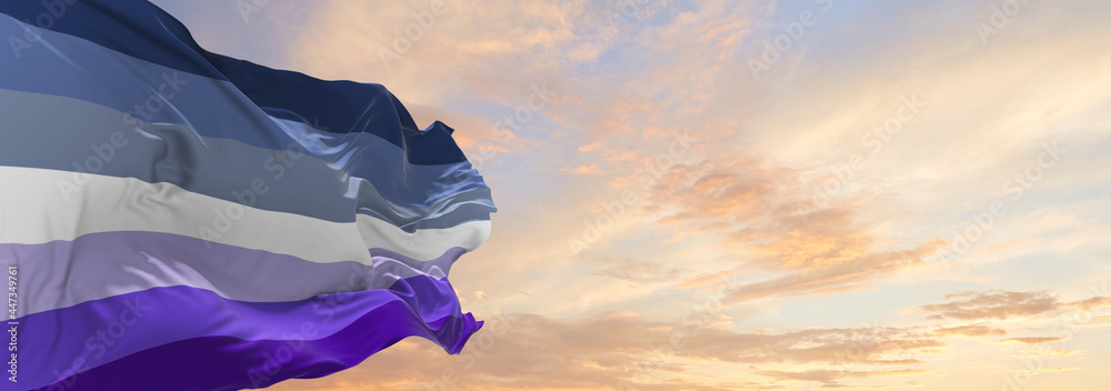 butch lesbian pride flag waving in the wind at cloudy sky. Freedom and ...