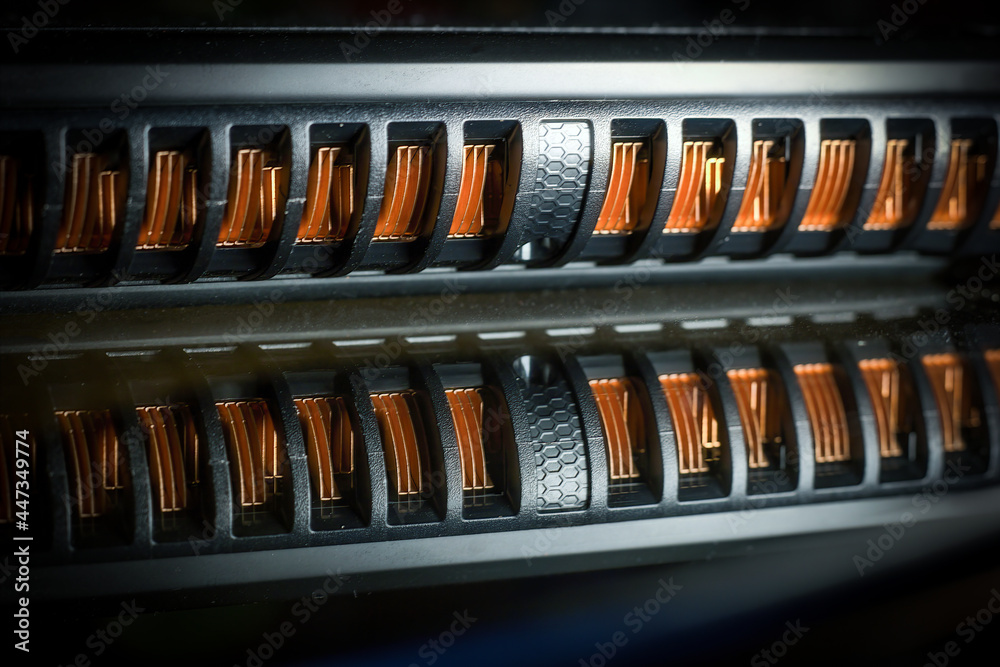 Macro photography of air vents at the side panel of a laptop or ...