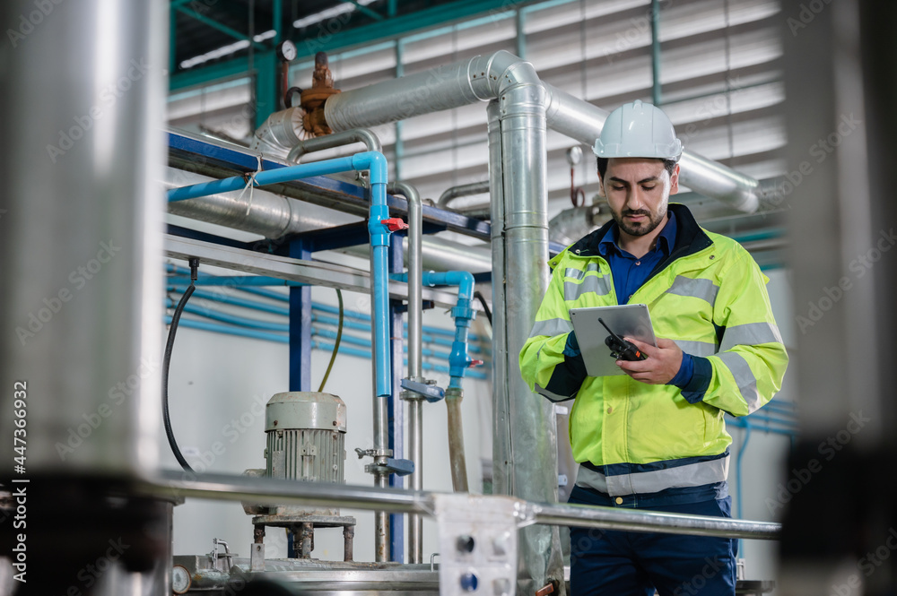 technician engineer working to maintenance a construction equipment ...