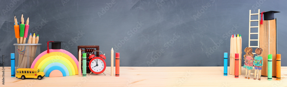 Back to school concept. Top view image of two kids standing next to ...