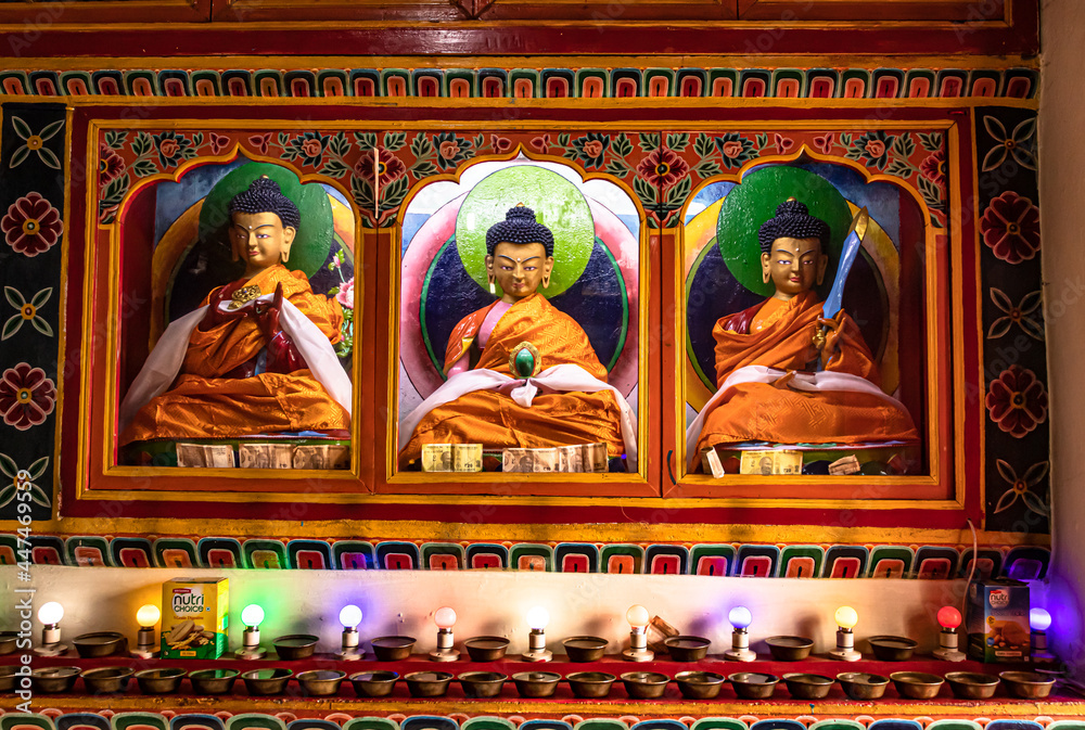 ancient buddhist monastery with Buddha statue and decorated wall from ...