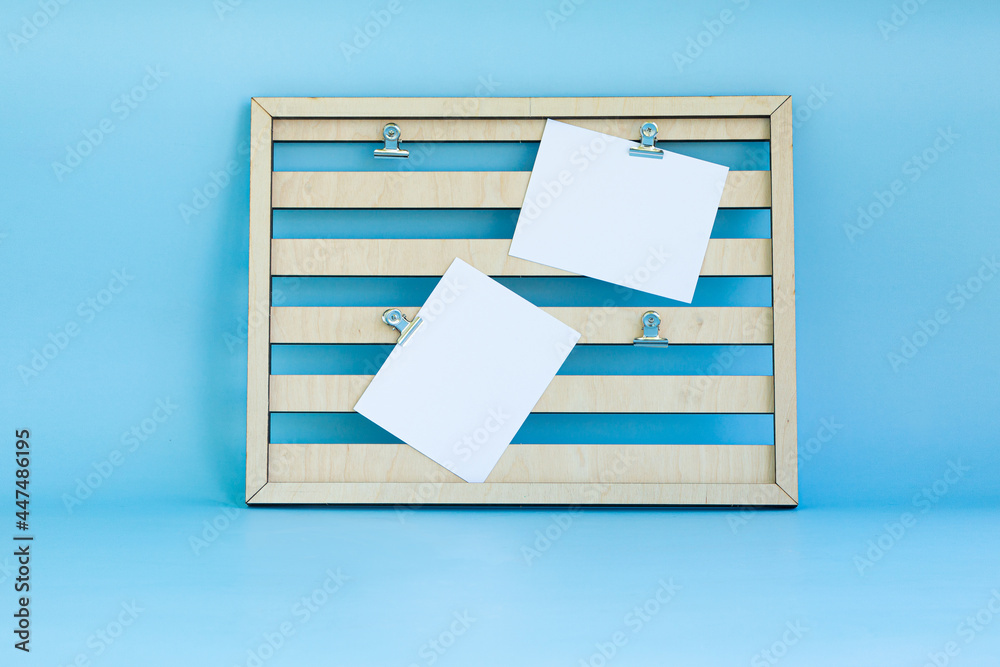 Frame on a light blue background with a place for signature on a white ...
