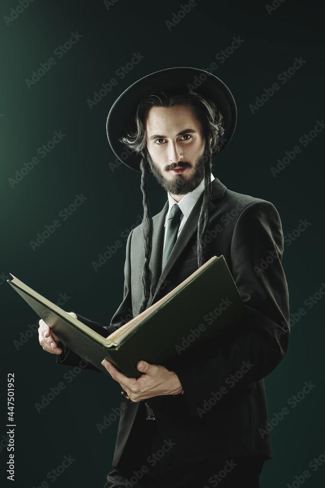 rabbi with big book Stock Photo | Adobe Stock