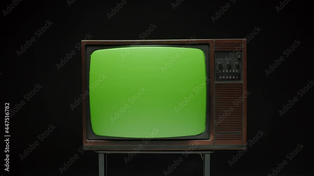 Old retro television with antenna on grey background. Broken old ...