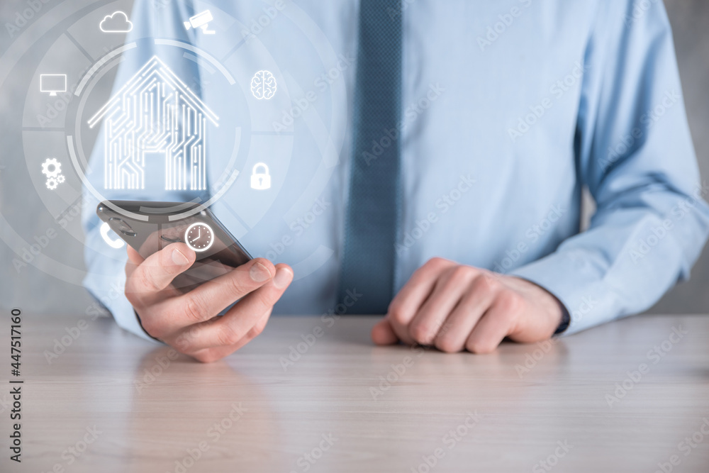 Businessman hold house icon.Smart home controlled, intelligent house ...