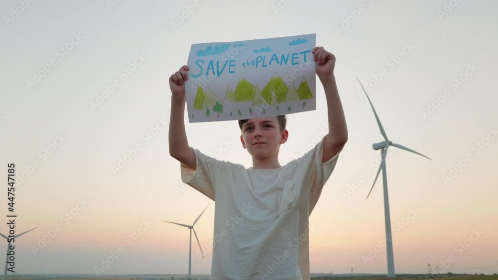 Save the planet poster protest boy holding in front of him on wind ...