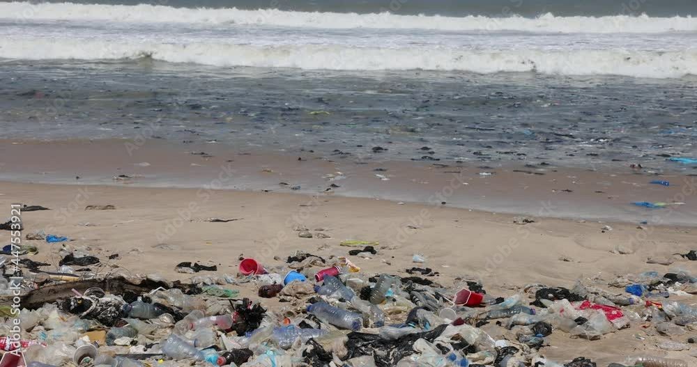 Trash Pollution sandy surf beach Accra Ghana Africa. Atlantic ocean ...