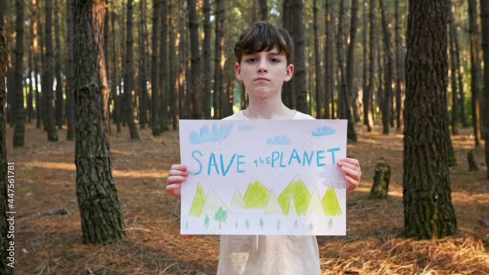 Green planet earth Save the planet poster protest boy holding in front ...