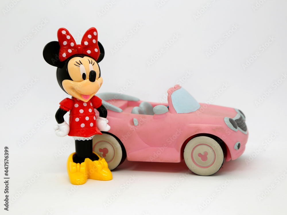 Minnie Mouse and her pink car. Toy. Cartoon character from Walt Disney ...