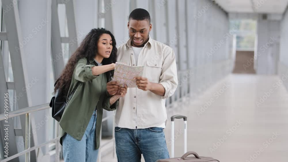 Multiracial young couple tourists hispanic woman wife and african man ...