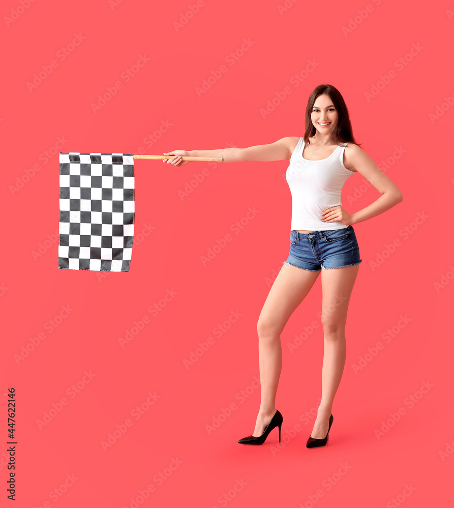 Beautiful young woman with racing flag on color background Stock Photo ...