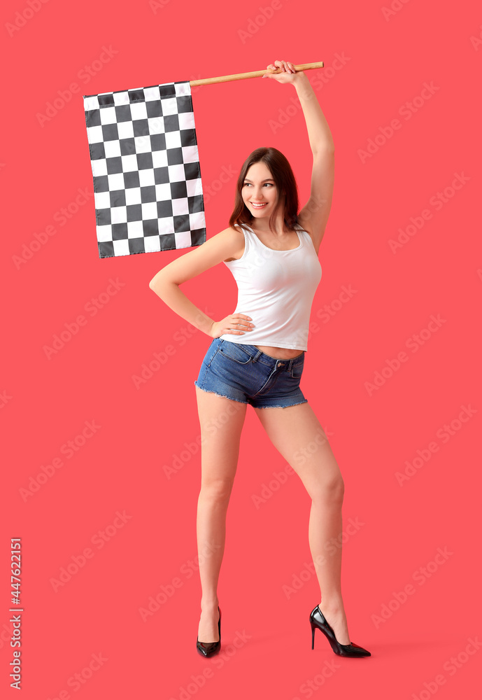 Beautiful young woman with racing flag on color background Stock Photo ...