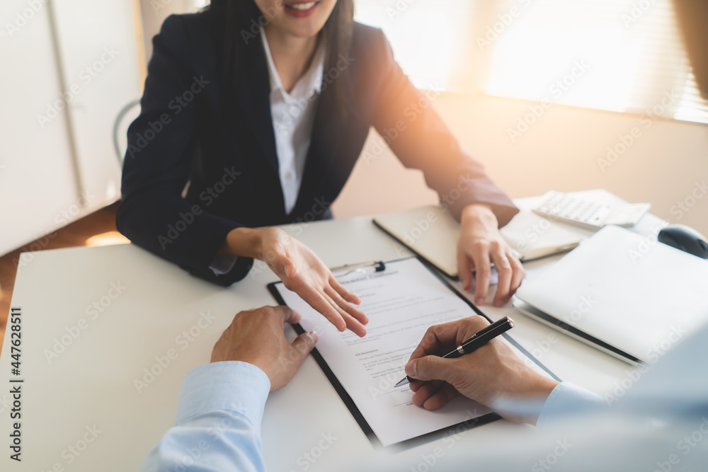 Person signing signature into employment contract. Stock Photo | Adobe ...
