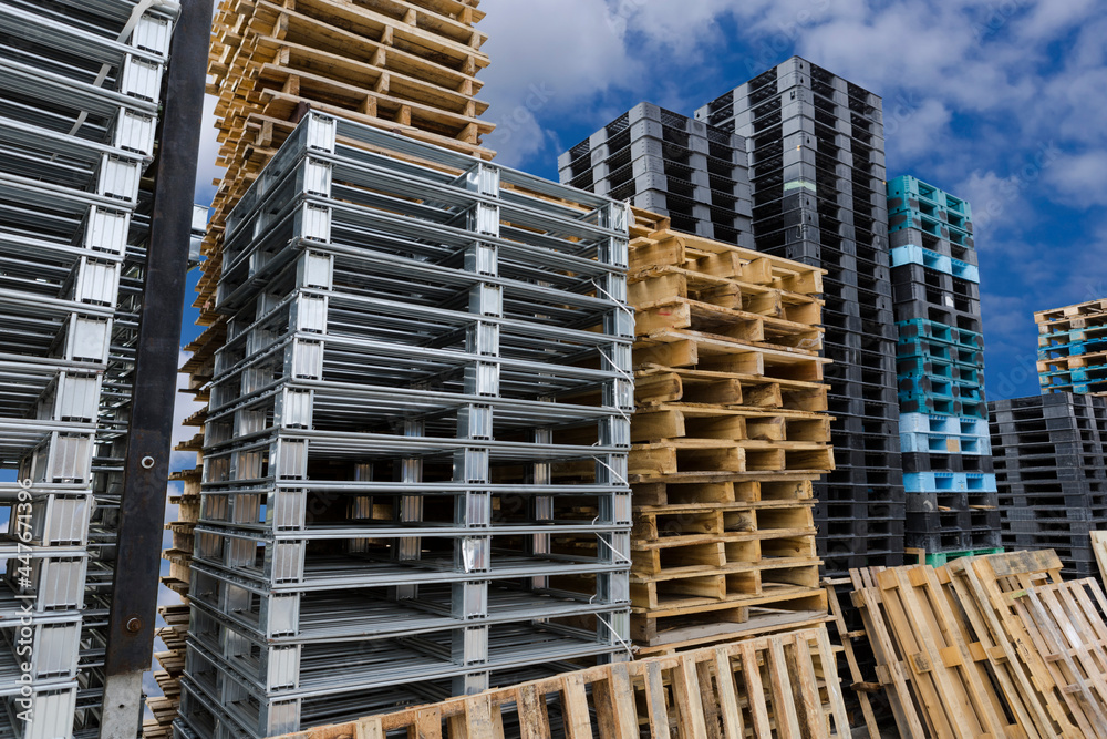 Different types of pallets are stacked in a row , Can be used as a ...