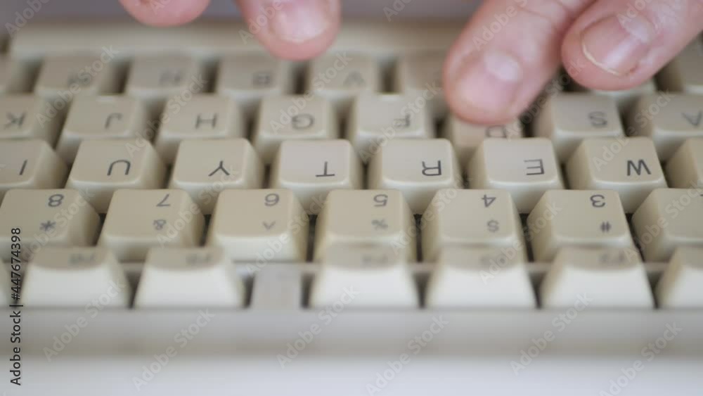 Close Up Shooting with a Keyboard and a Computer Programmer Typing a ...