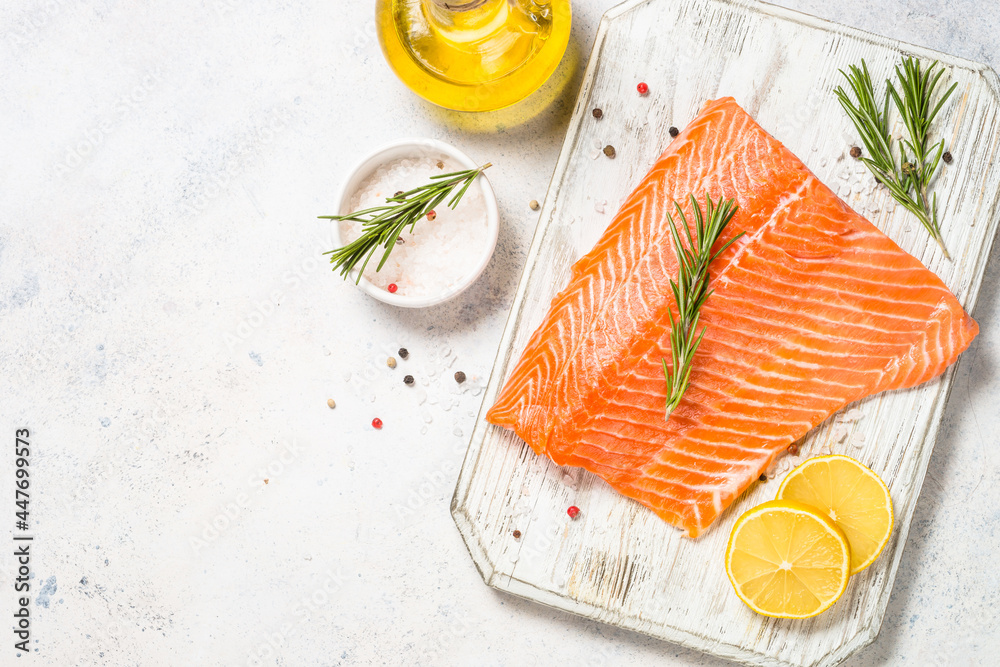 Salmon fillet with ingresients for cooking. Raw fish. Top view at white ...