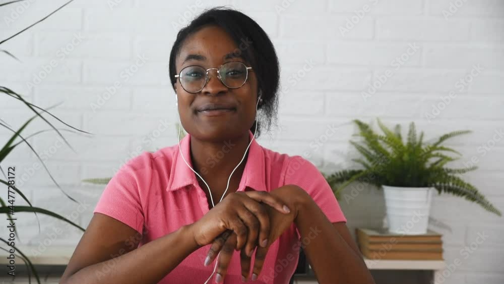 Young black African woman explaining on video call job interview why is ...