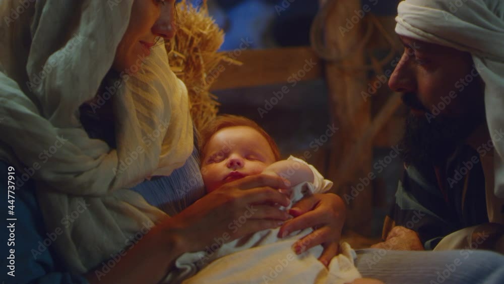 Mary and Joseph admiring sleeping baby Jesus nativity vídeo do Stock ...