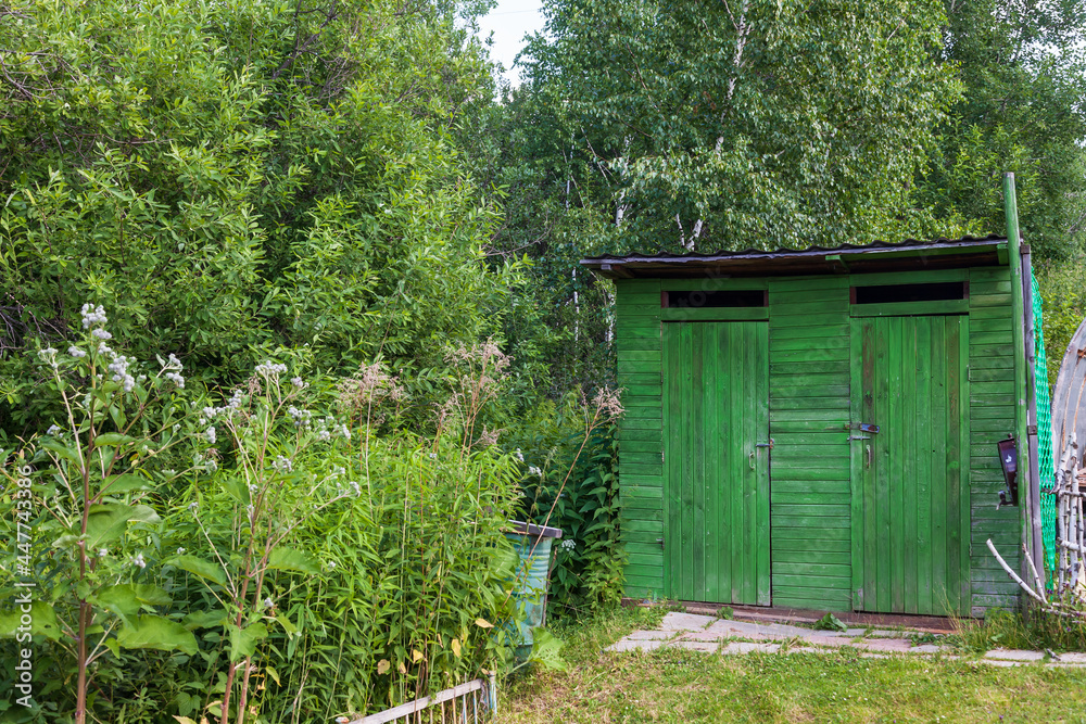 Green Country toilet in the open air. Wooden structure for outdoor ...