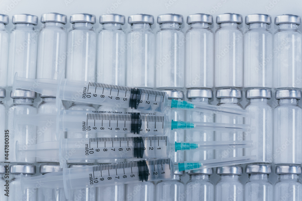 Medicine, Injection, vaccine and disposable syringe, drug concept ...