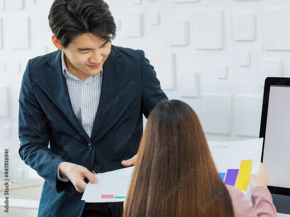 Asian young happy male officer staff wears black formal suit stand ...