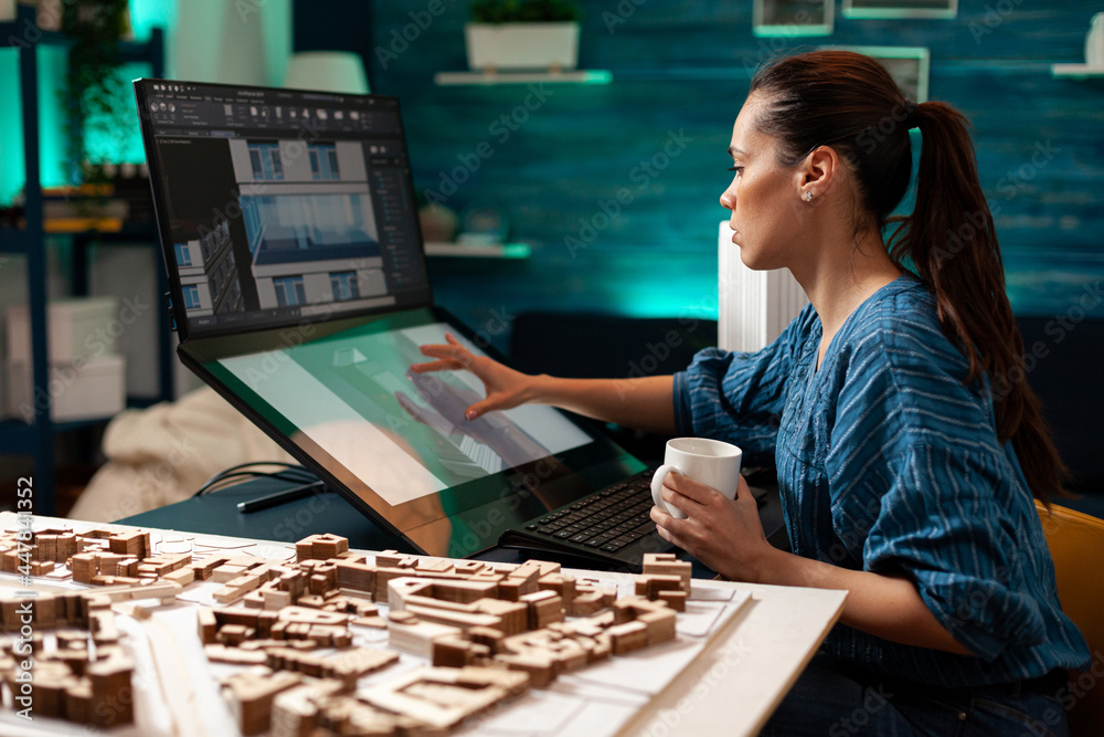 Architectural designer doing engineering sketch using touchpad screen ...