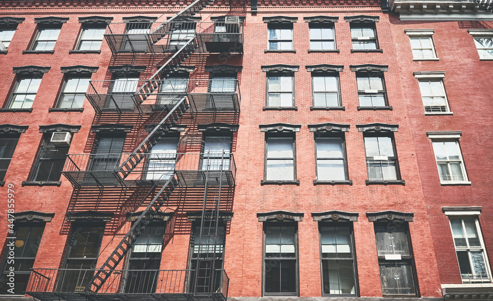 Old red brick building with iron fire escape, New York City, USA. Stock ...