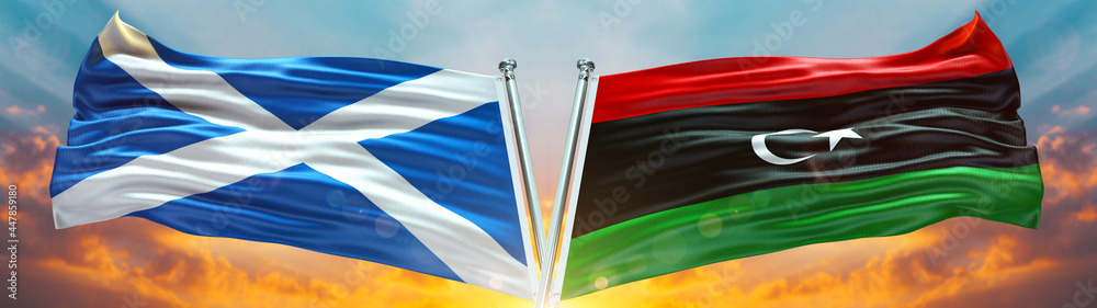 Scotland Flag and Libya flag waving with texture sky Cloud and sunset ...