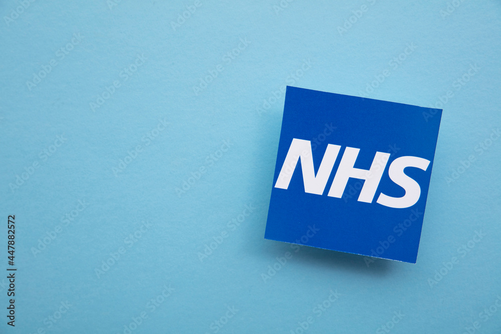 LONDON, UK - July 2021: NHS National health service logo on a blue ...