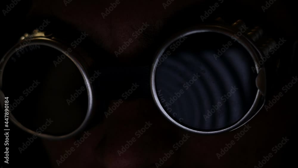 Freak man hypnotized by a spiral hypnotic effect looking at the ...