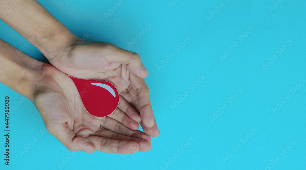 Hands holding blood drop, give blood donation, blood transfusion, world ...