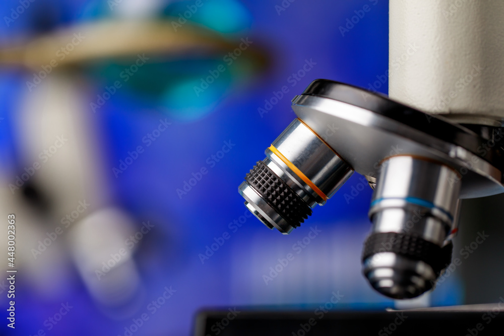 Modern scientific microscope with selective lens objectives for various ...