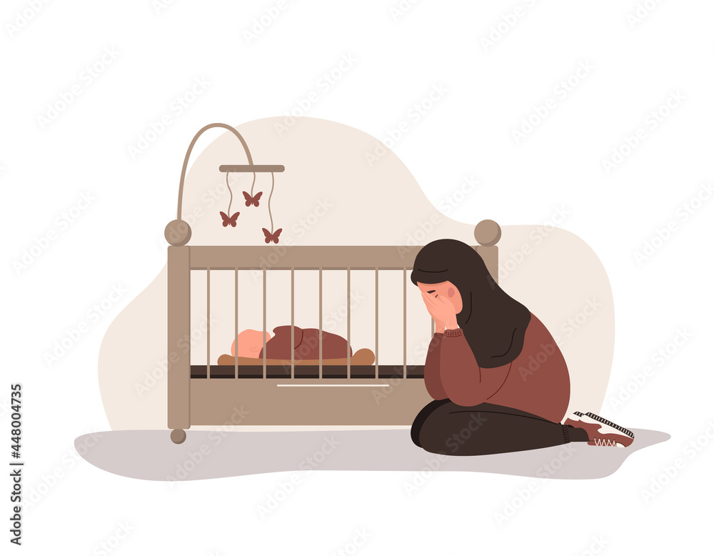 Postpartum depression. Arab tired woman is sitting on the floor near ...