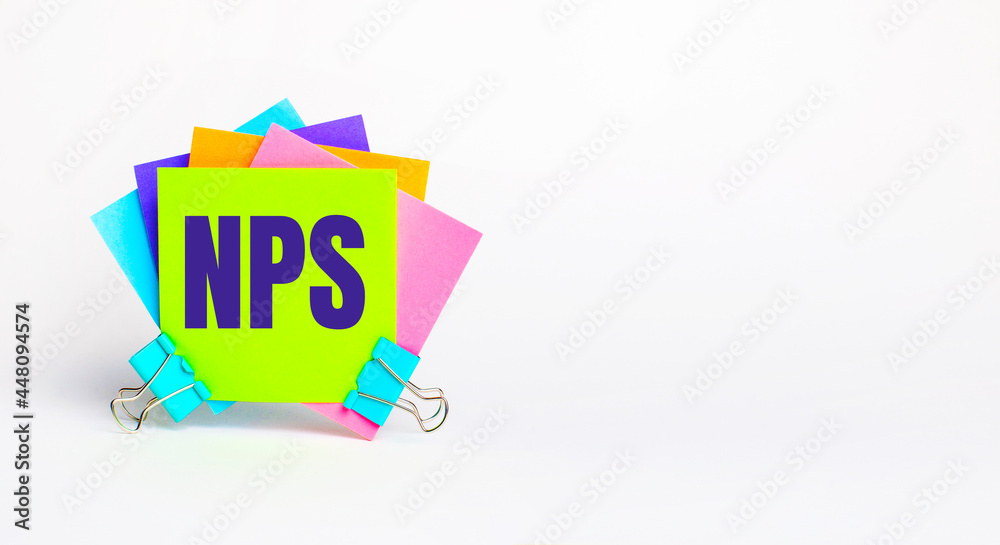 There are bright multi-colored stickers with the text NPS Net Promoter ...