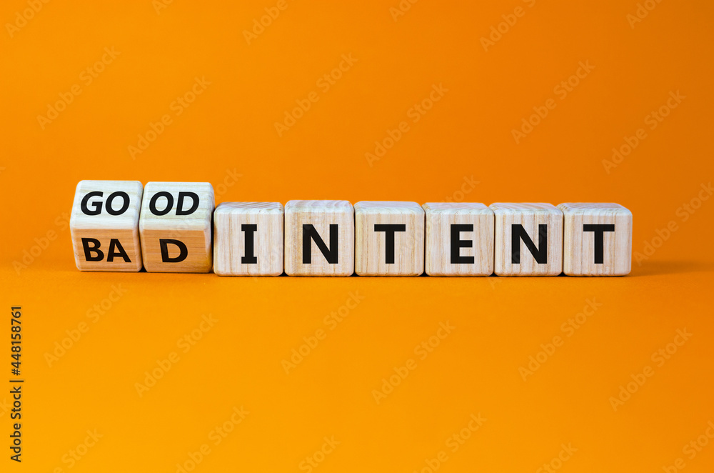 Good or bad intent symbol. Turned wooden cubes, changed words 'bad ...