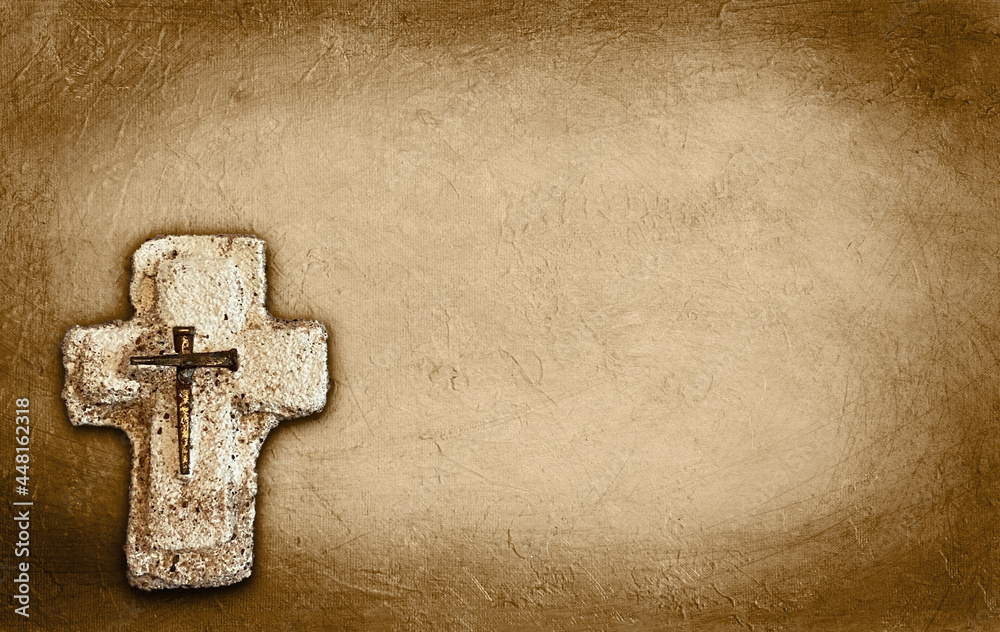 sand-cast plaster cross with nails on textured paint background in ...