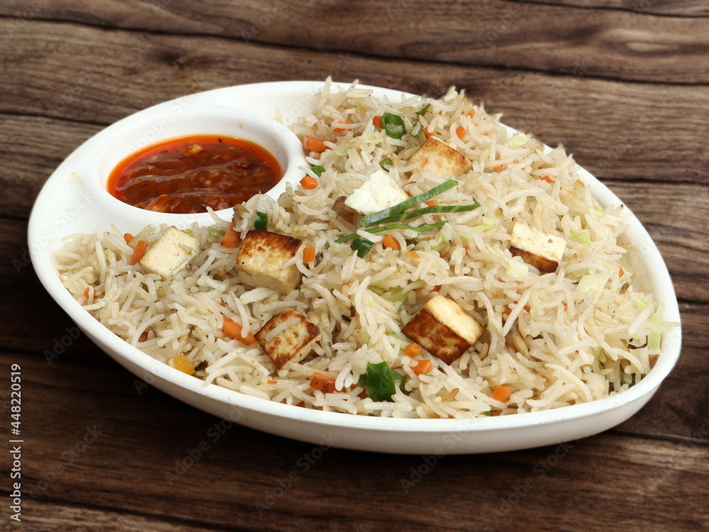 Healthy and tasty Paneer fried rice made of rice, mixed veggies and ...