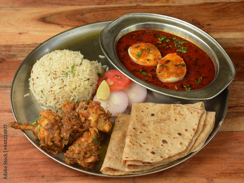 Chicken Thali from an indian cuisine, food platter consists Chicken fry ...