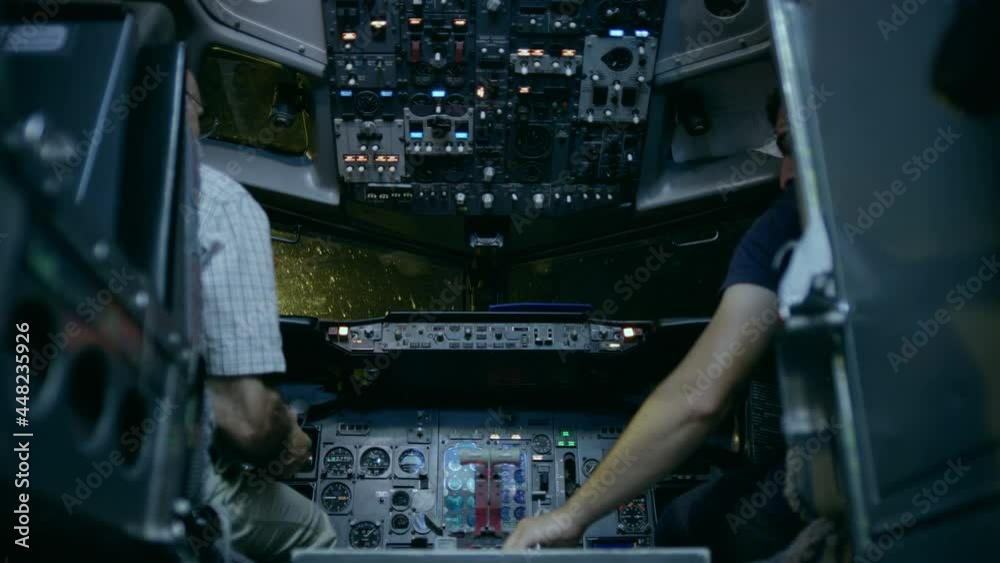 Vídeo do Stock: Two caucasian male pilots in the cockpit or flight deck ...