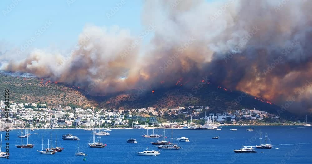 Breaking news: Flames and smoke from wildfires cover the landscape ...