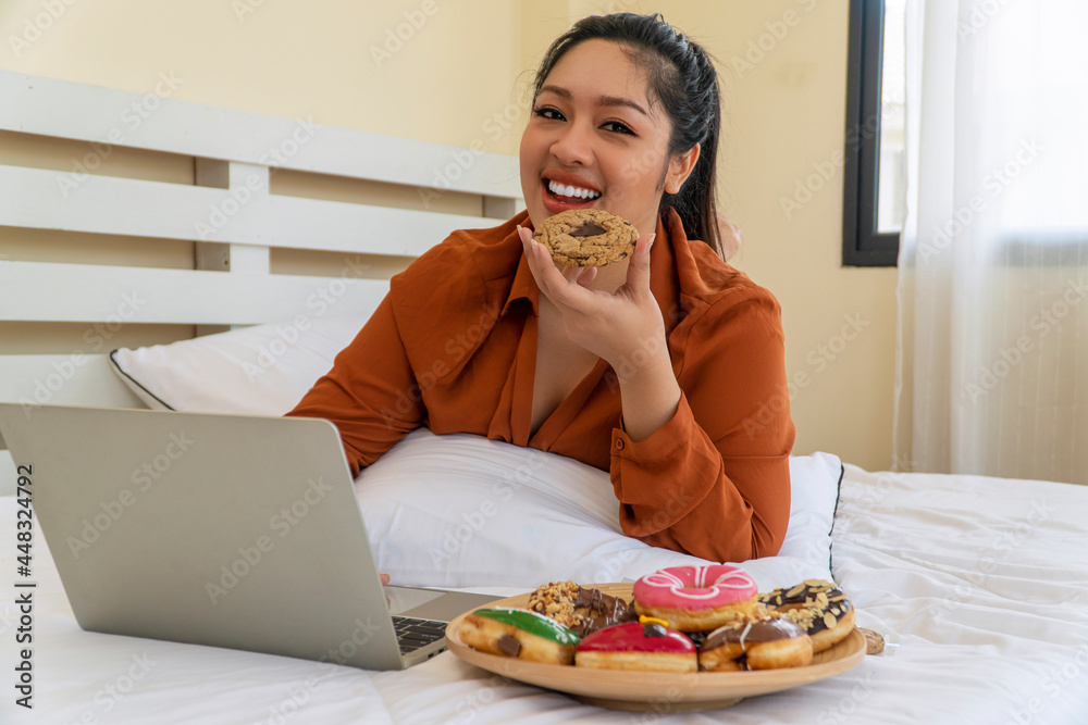 Unhealthy eating concept. Overweight fat woman holding plate with ...
