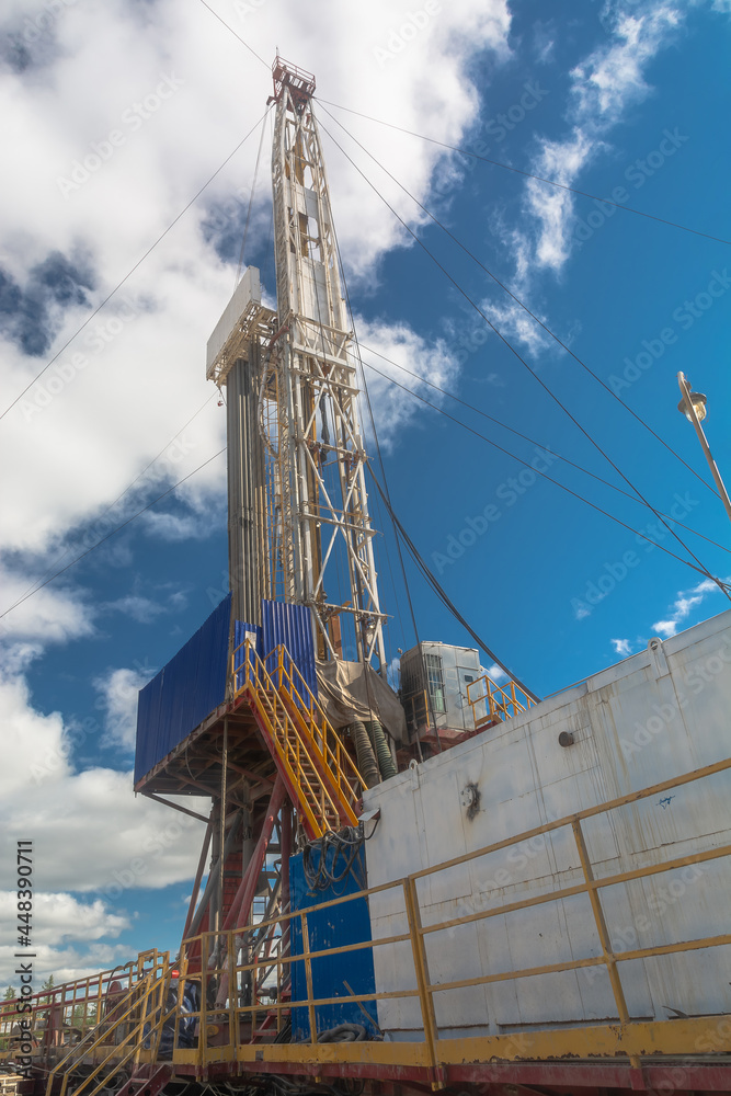 The design of a drilling rig for drilling wells in an oil and gas field ...