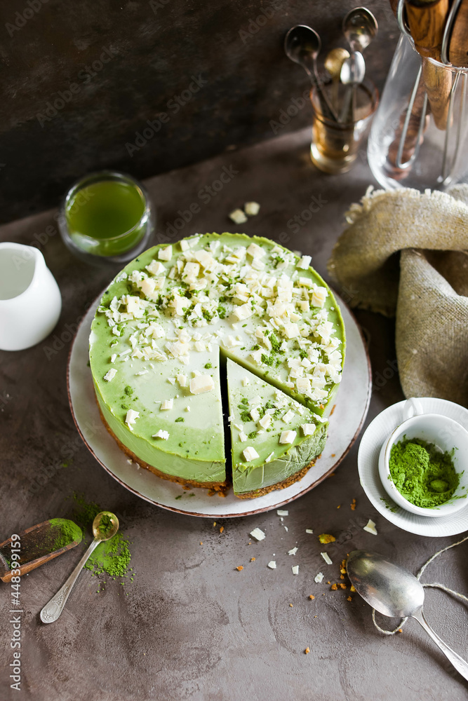 Layered cake with white chocolate and matcha tea. Mousse dessert in a ...