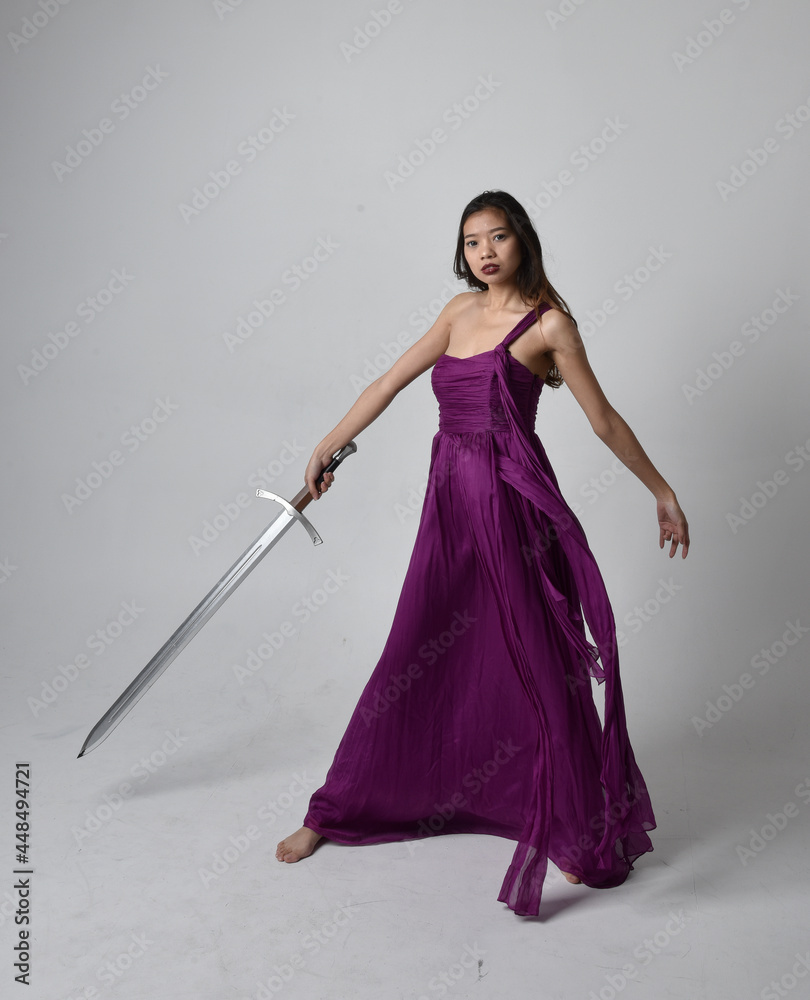 Full length portrait of pretty brunette asian girl wearing purple ...